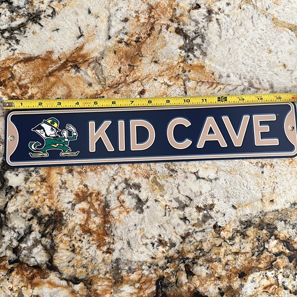 Accents | Ncaa Notre Dame Metal Sign Fighting Irish Mascot Kid Cave ...
